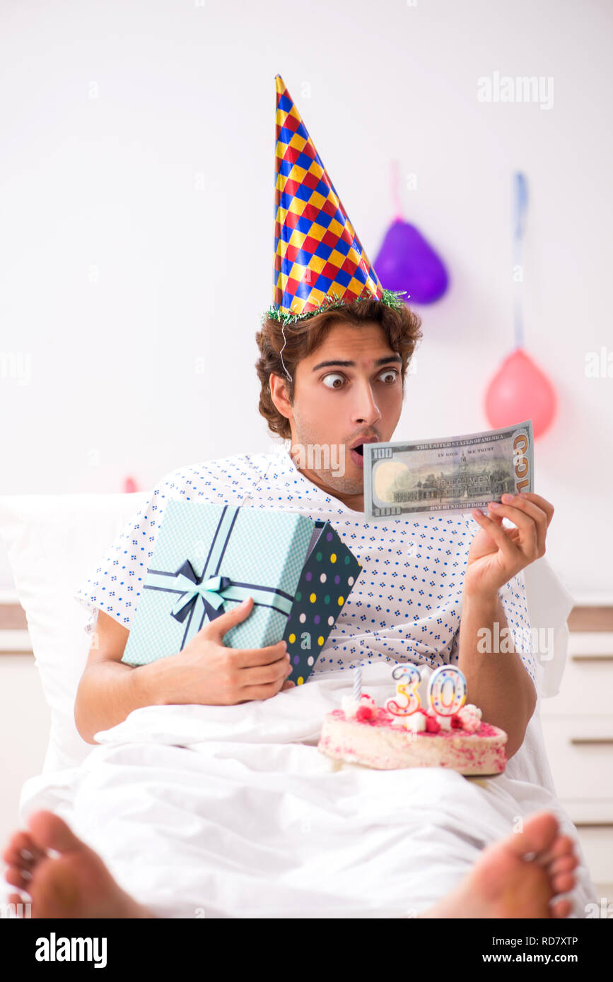 Young man celebrating his birthday in hospital Stock Photo - Alamy