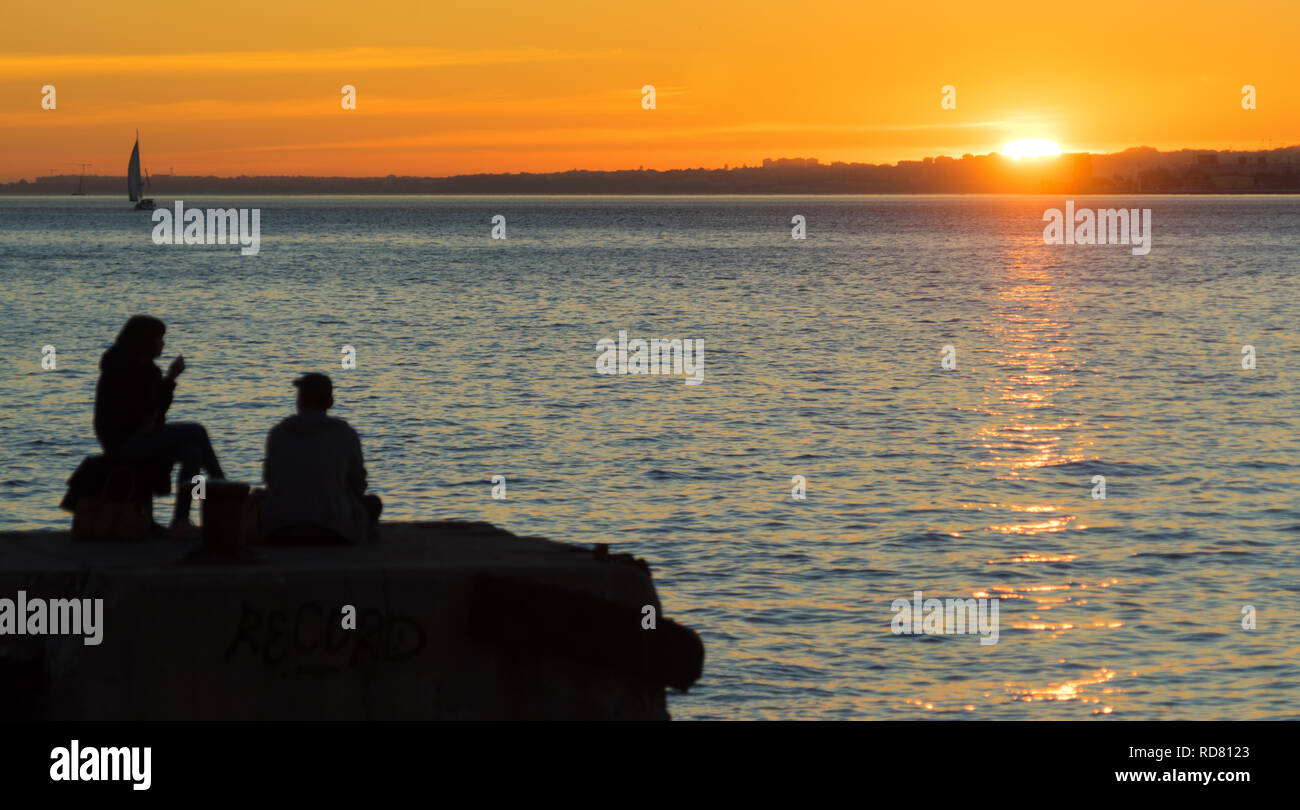 Lisbon, sunset over rio Targus Stock Photo - Alamy