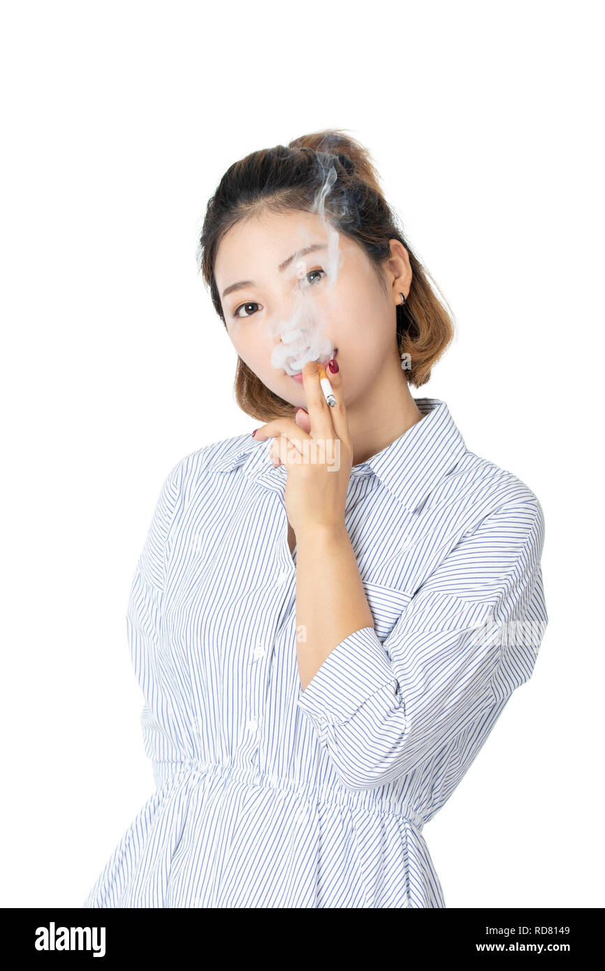 Young asian woman smoking cigarette hi-res stock photography and images ...