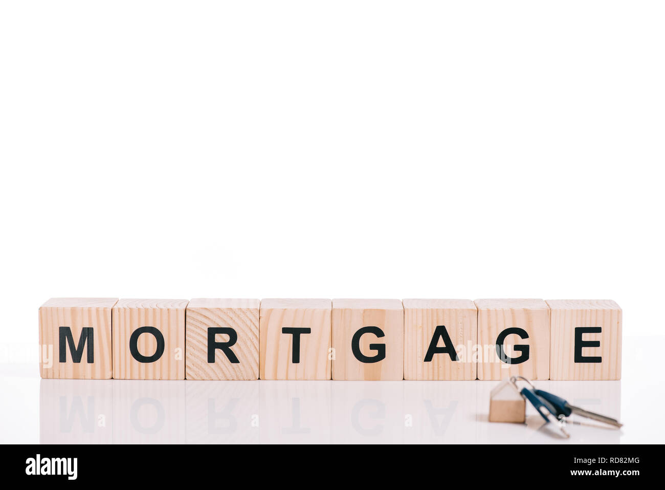 wooden blocks with mortgage lettering and keys isolated on white Stock ...