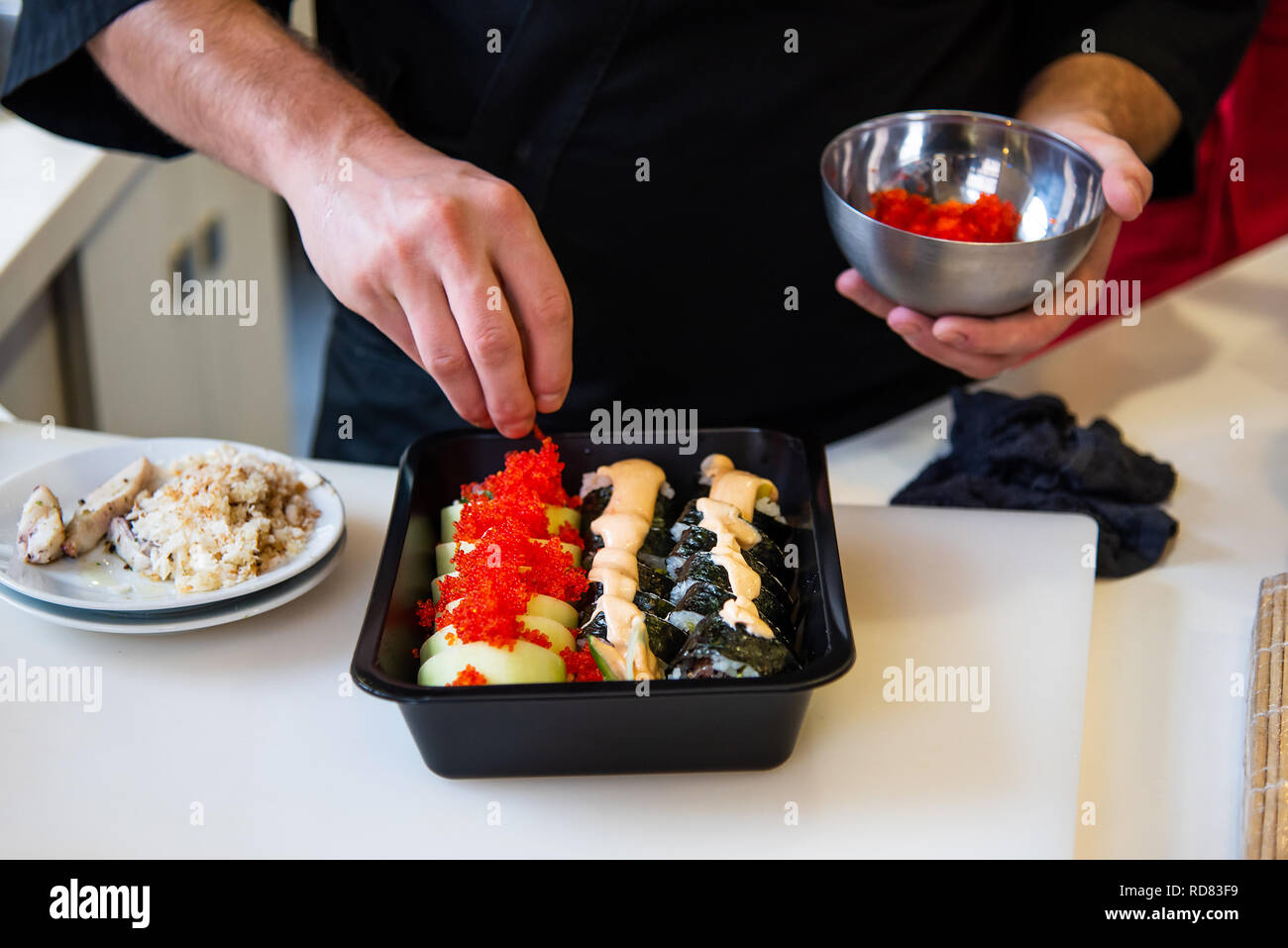 Chef making sushi in the bar close up Stock Photo - Alamy Chef making sushi in the bar close up Stock Photo - Alamy
