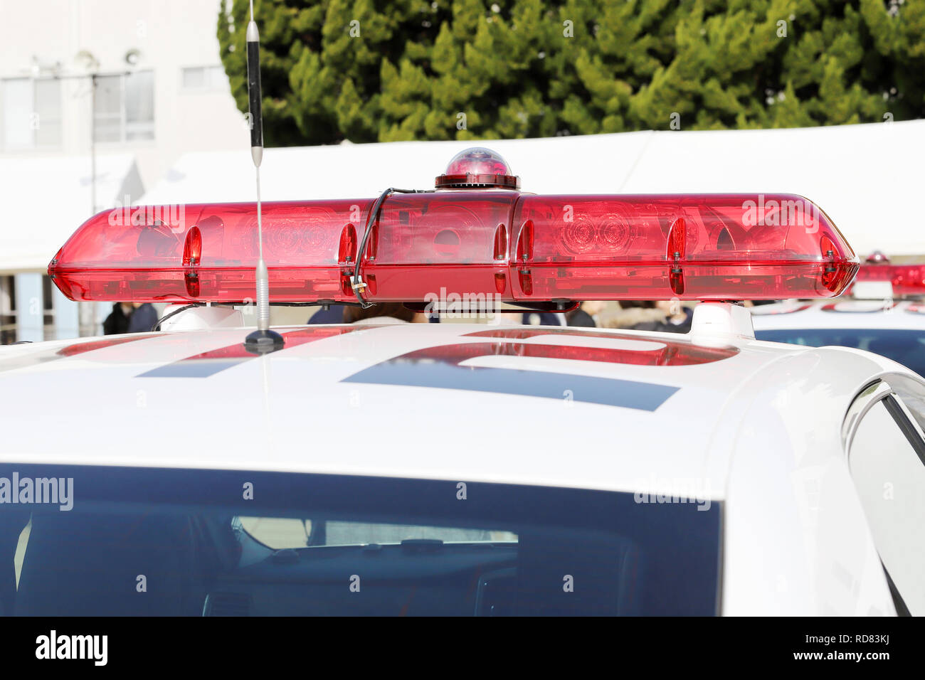 Closeup of the body of the Japanese police car with a sign POLICE Stock ...