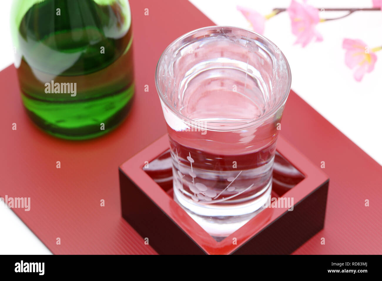 Japanese wooden box masu with sake isolated on white background Stock ...