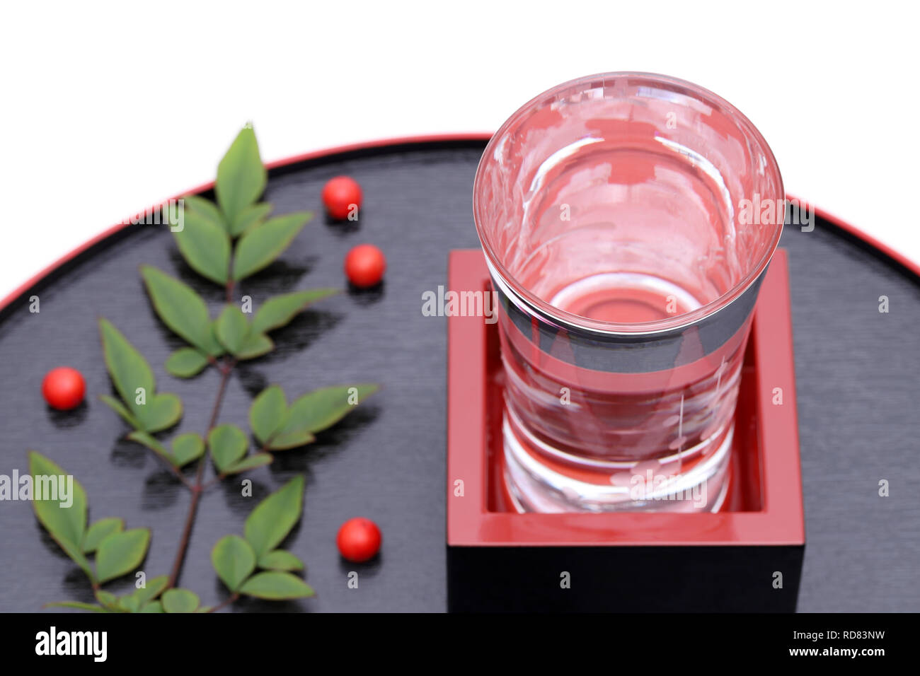 Japanese wooden box masu with sake isolated on white background Stock ...