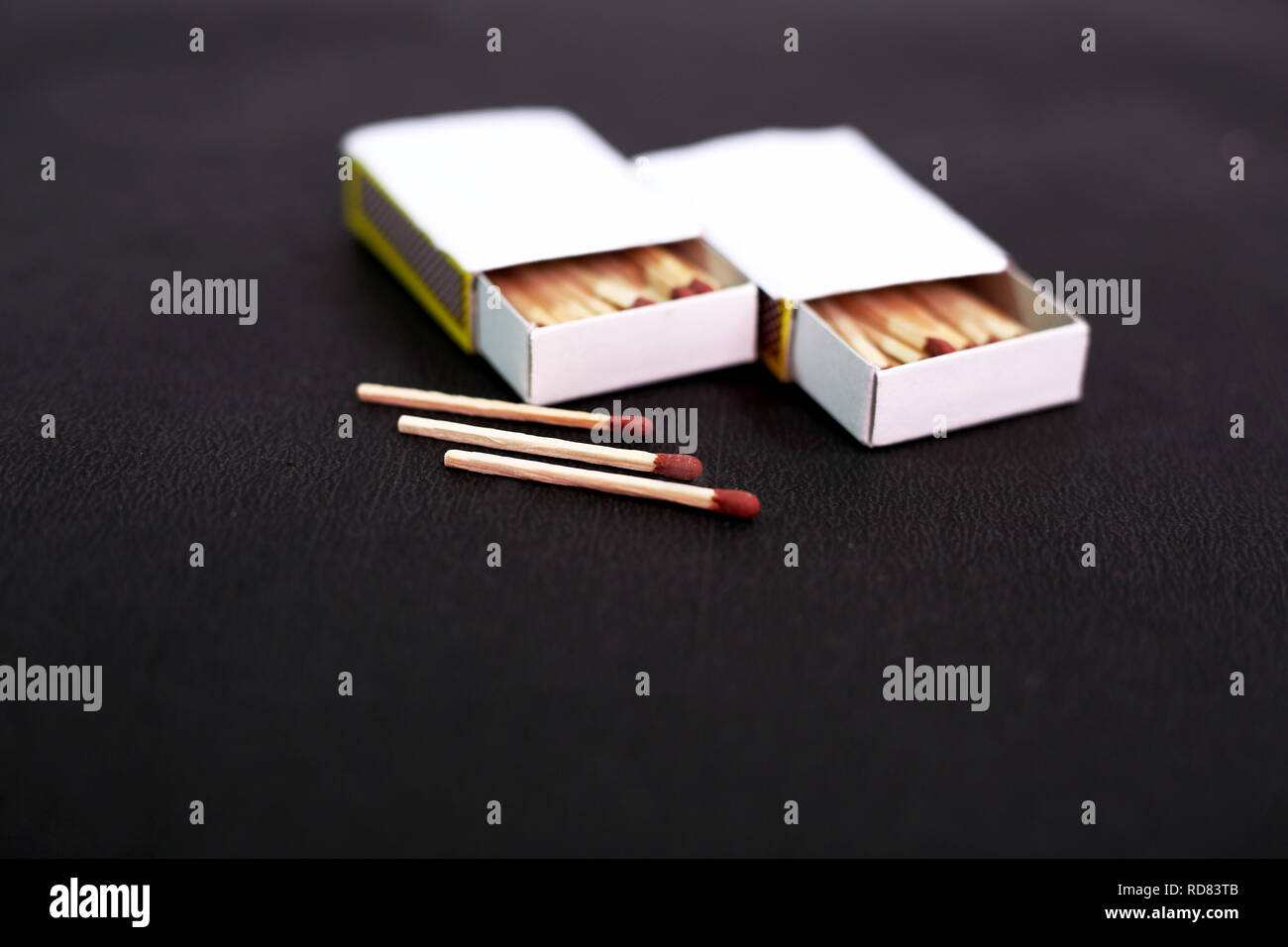 Portrait of wooden matchstick with matches box. Isolated on the white ...