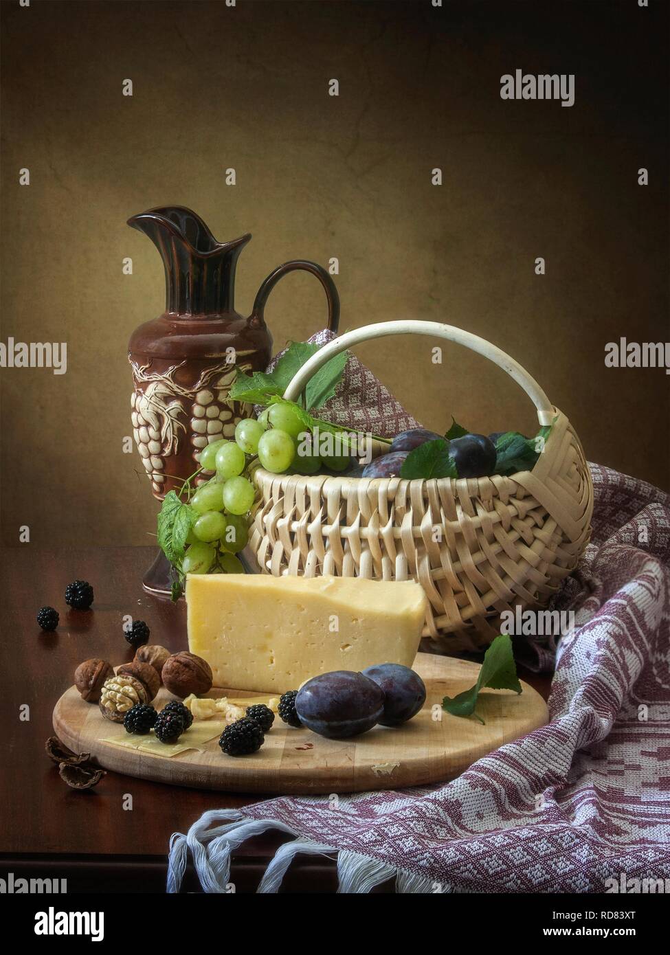 Still life with fruit and cheese Stock Photo - Alamy