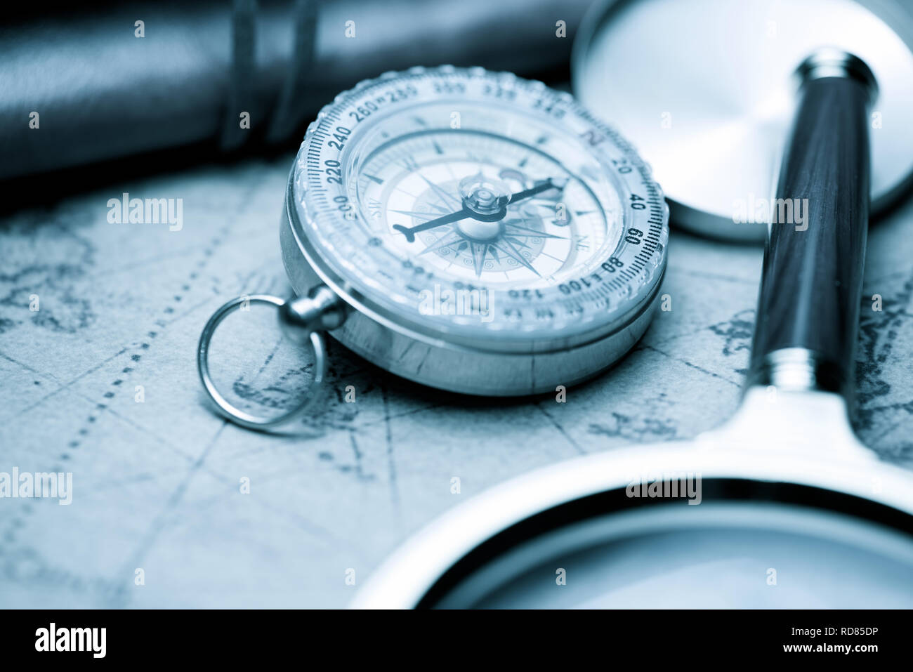 Vintage compass and old navigation map Stock Photo - Alamy