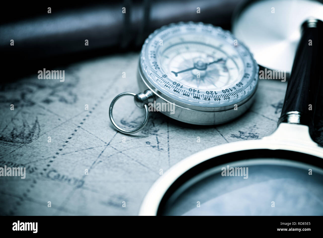 Vintage compass and old navigation map Stock Photo - Alamy