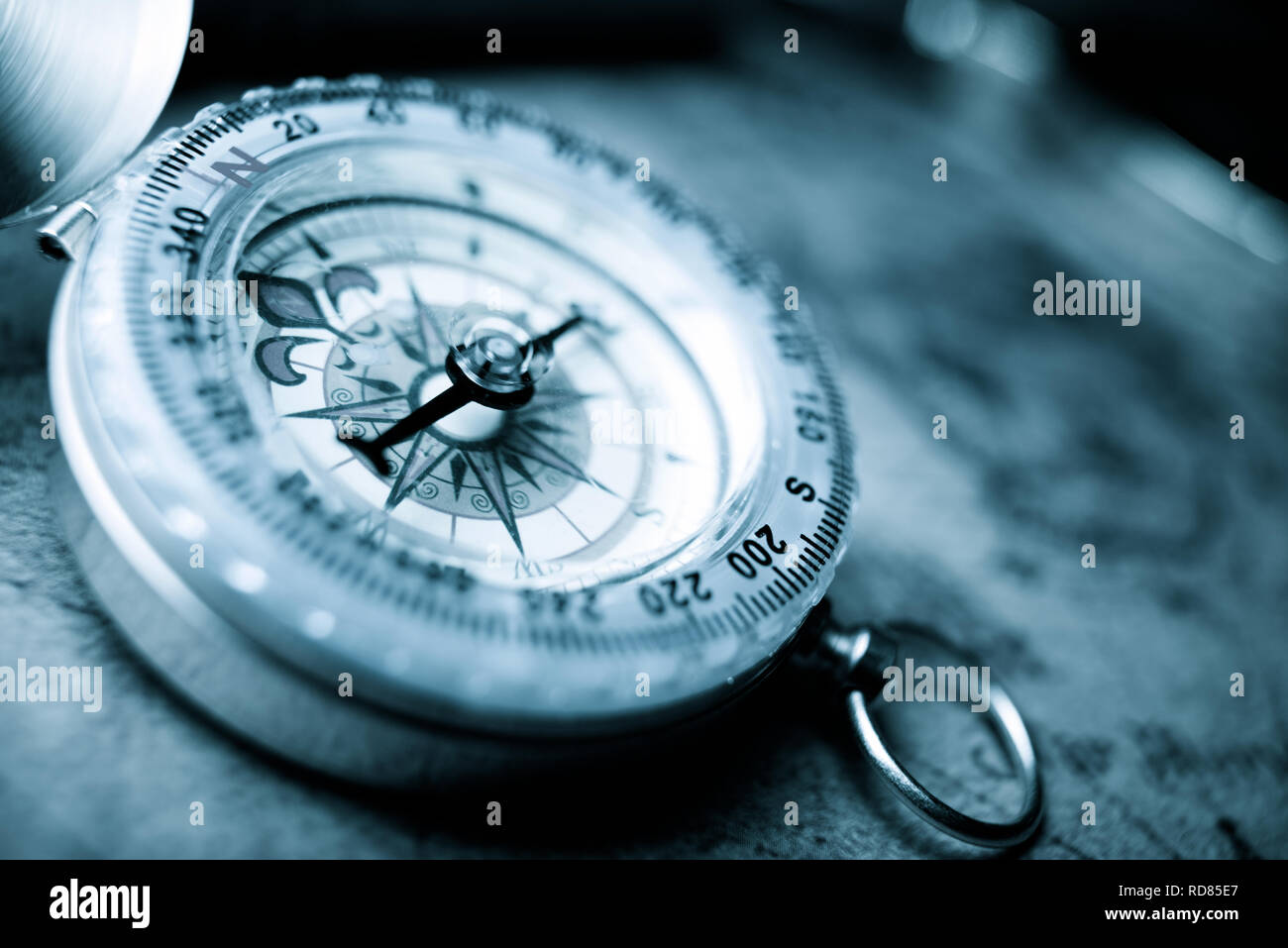 Vintage compass and old navigation map Stock Photo - Alamy