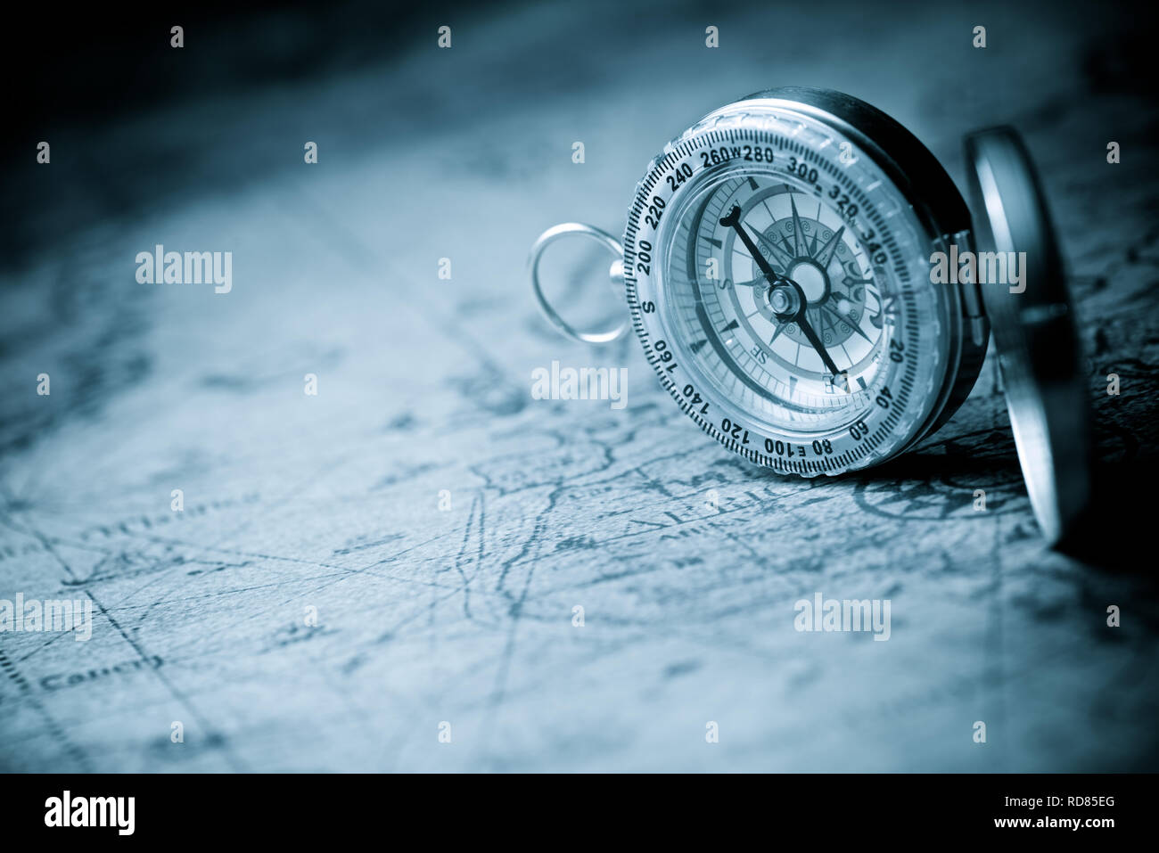 Vintage compass and old navigation map Stock Photo - Alamy