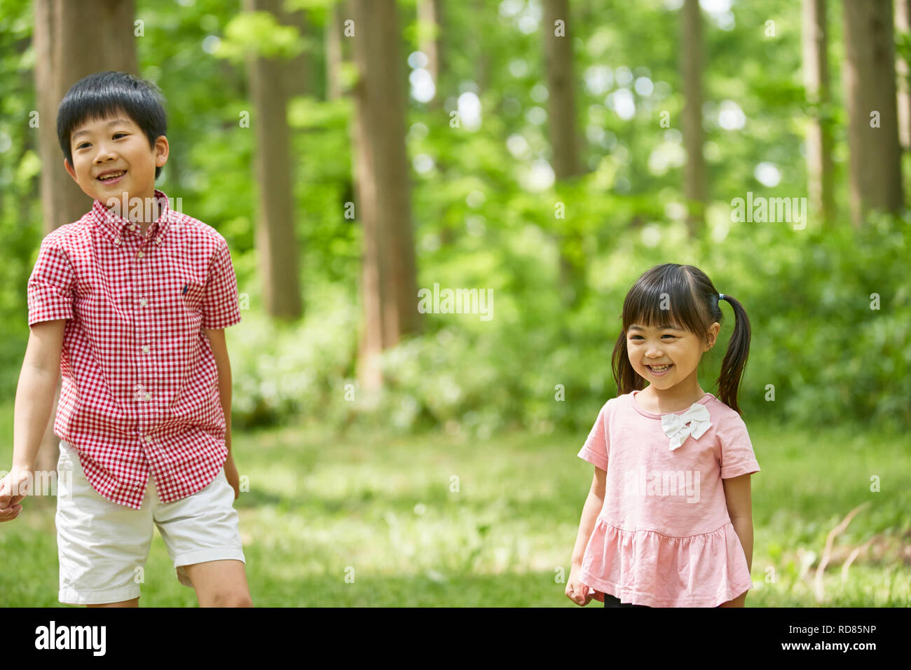 Japanese kids in a city park Stock Photo - Alamy