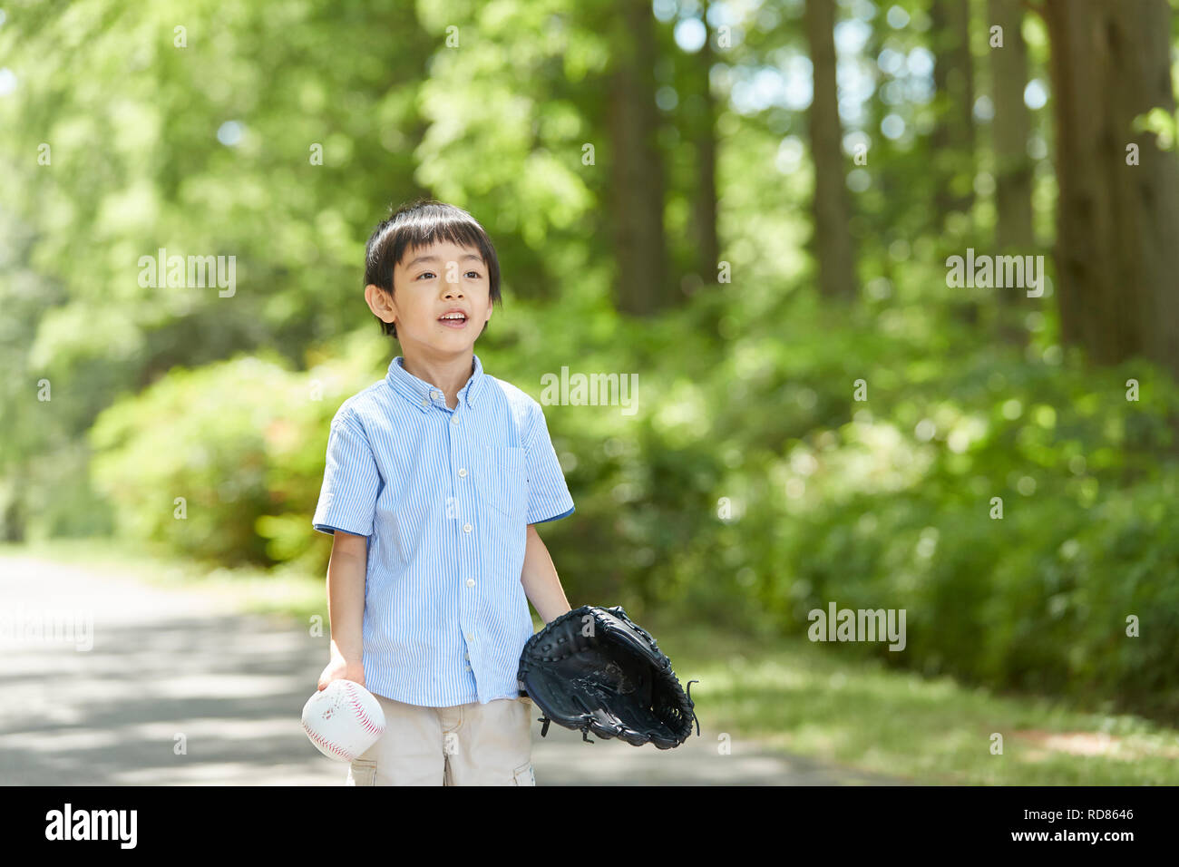 Japanese kid in a city park Stock Photo - Alamy