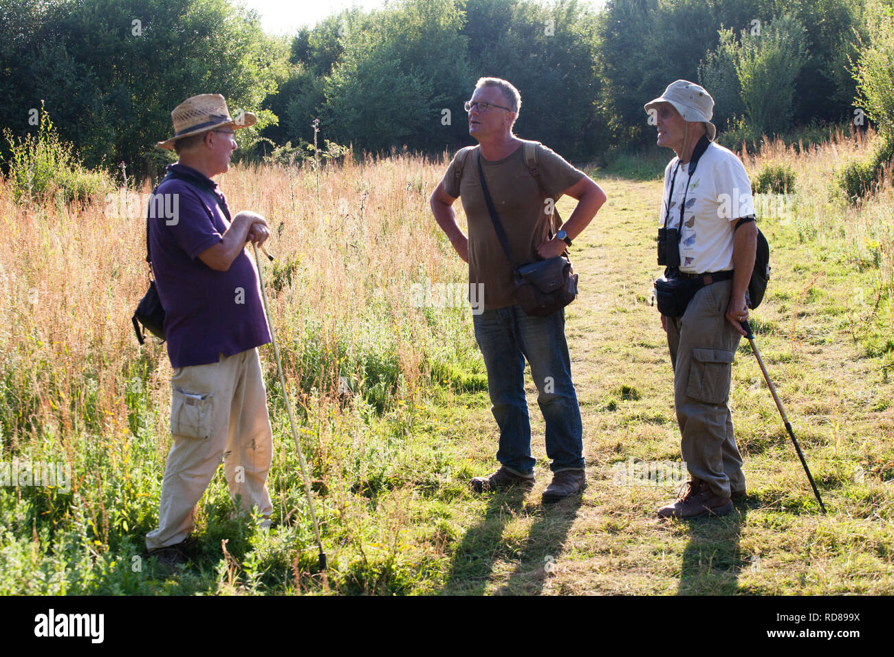 Mathew Oates,( dressed in purple shirt) -left, world expert on Purple ...