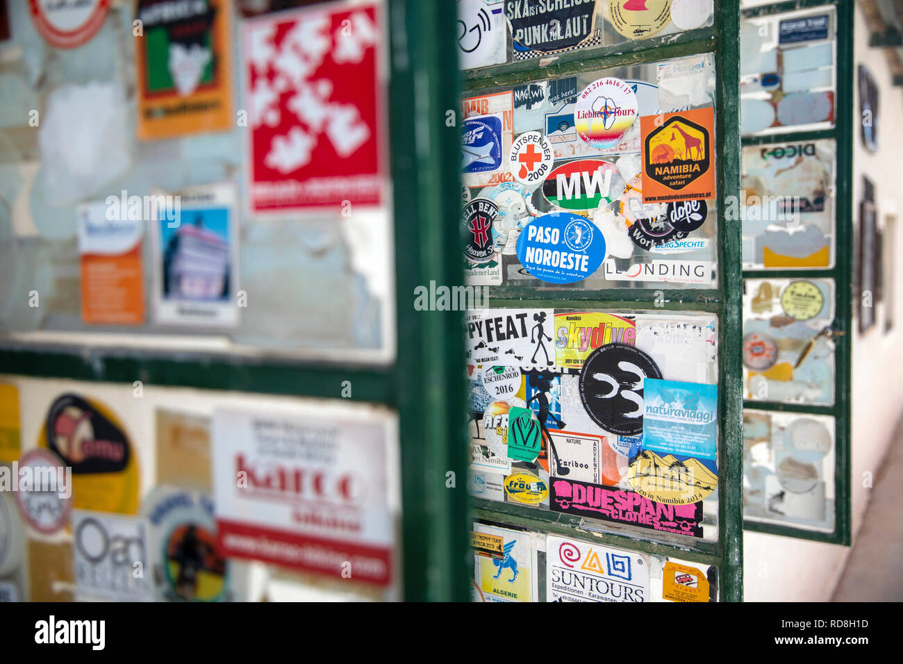 Colorful decals on windows of general dealer store [Shallow Depth of ...