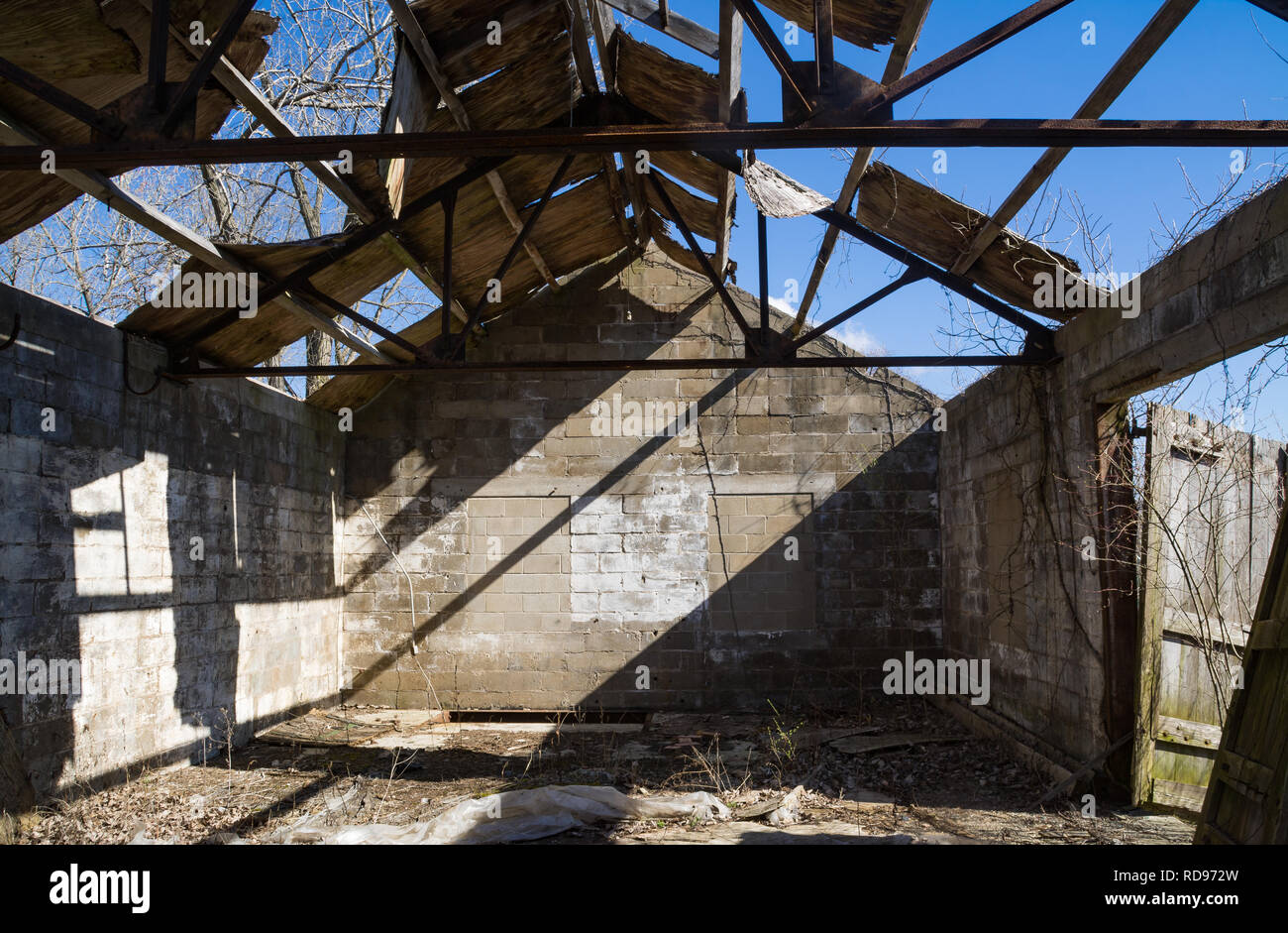 Broken down structure in abandoned factory Stock Photo - Alamy