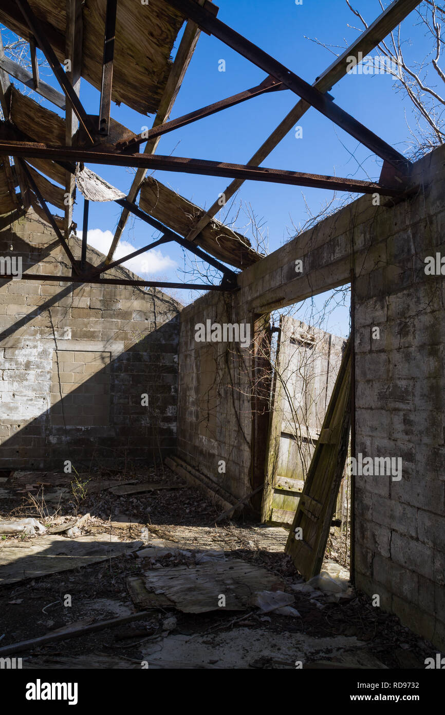 Broken down structure in abandoned factory Stock Photo - Alamy