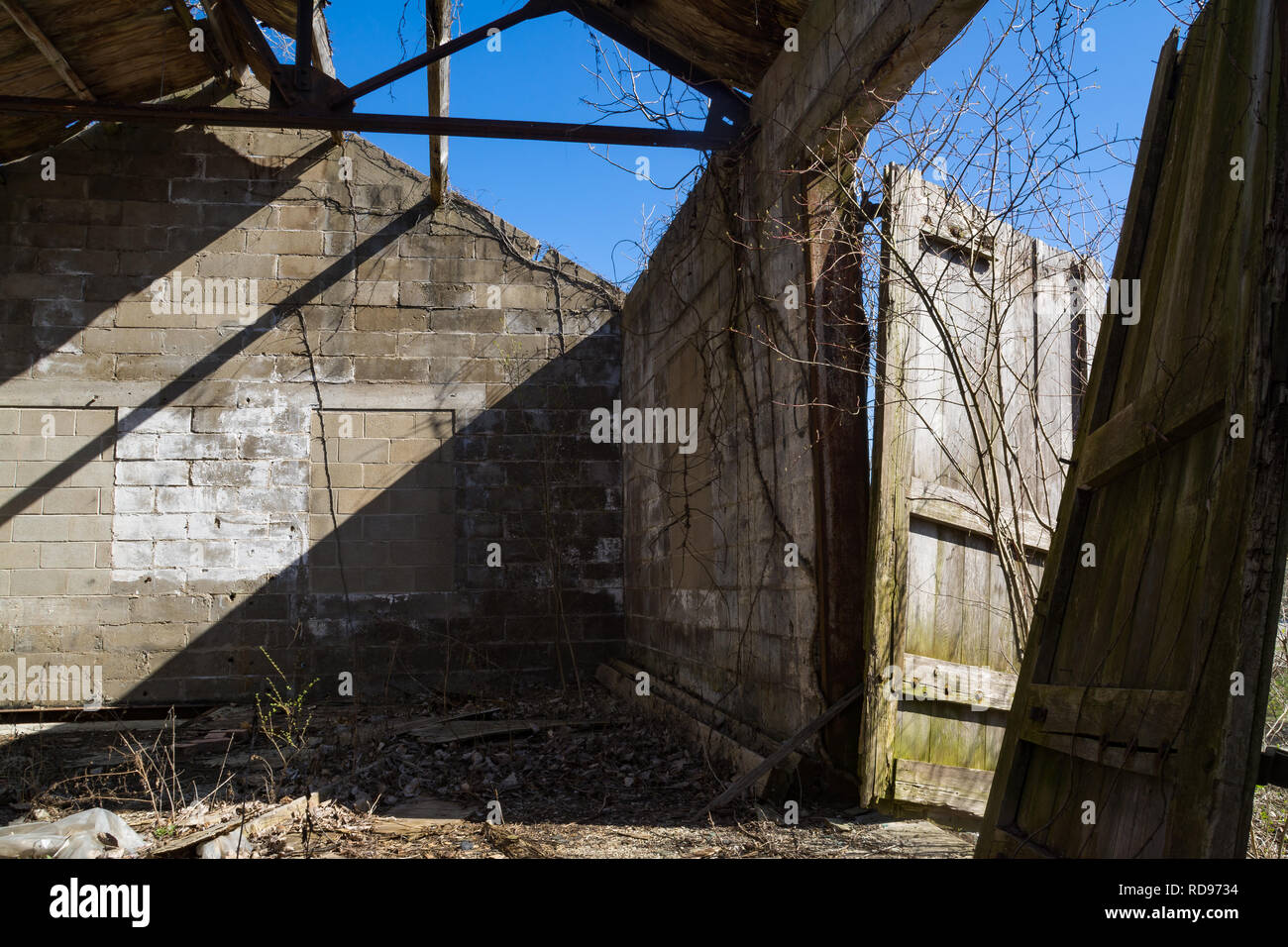 Broken down structure in abandoned factory Stock Photo - Alamy