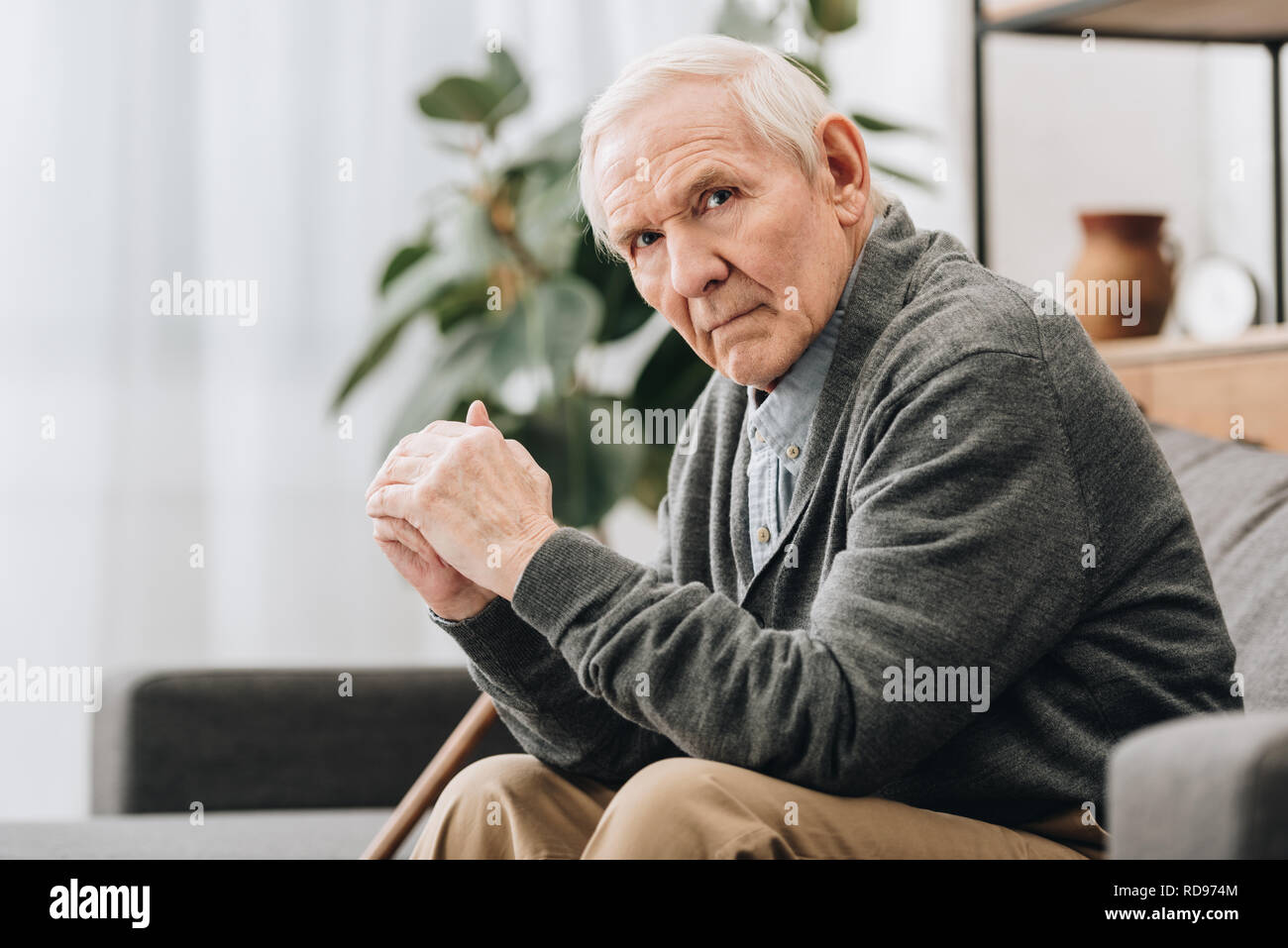 Old man in sad mood hi-res stock photography and images - Alamy
