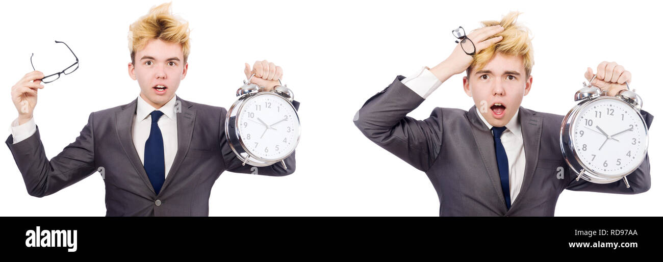 Young boy with alarm-clock in time management concept Stock Photo - Alamy