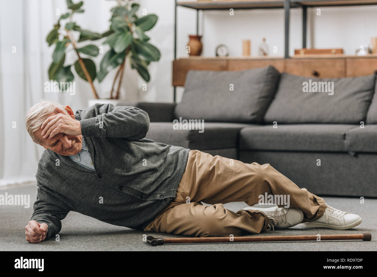 Old person falling down hi-res stock photography and images - Alamy