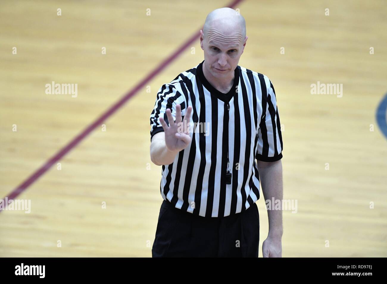 Basketball referee signals foul hi-res stock photography and images - Alamy