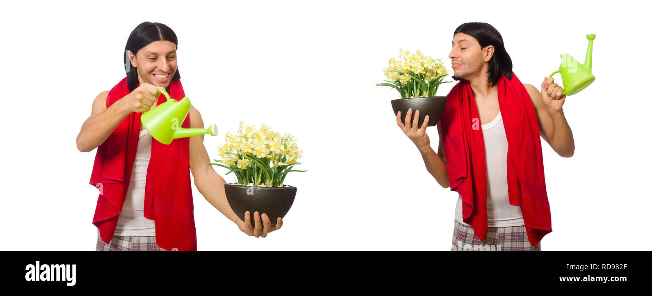 Young man watering flowers isolated on white Stock Photo - Alamy