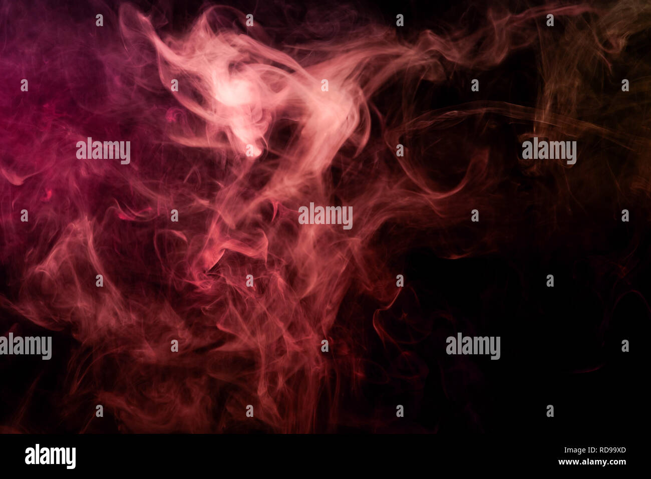 Red and pink cloud smoke on black isolated background Stock Photo - Alamy