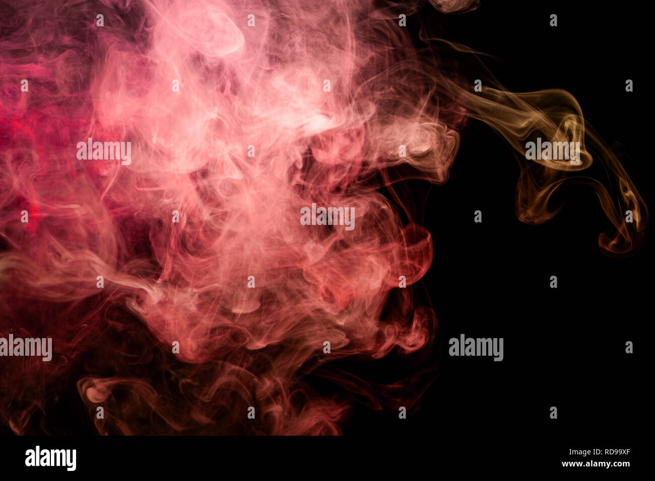 Red and pink cloud smoke on black isolated background Stock Photo - Alamy