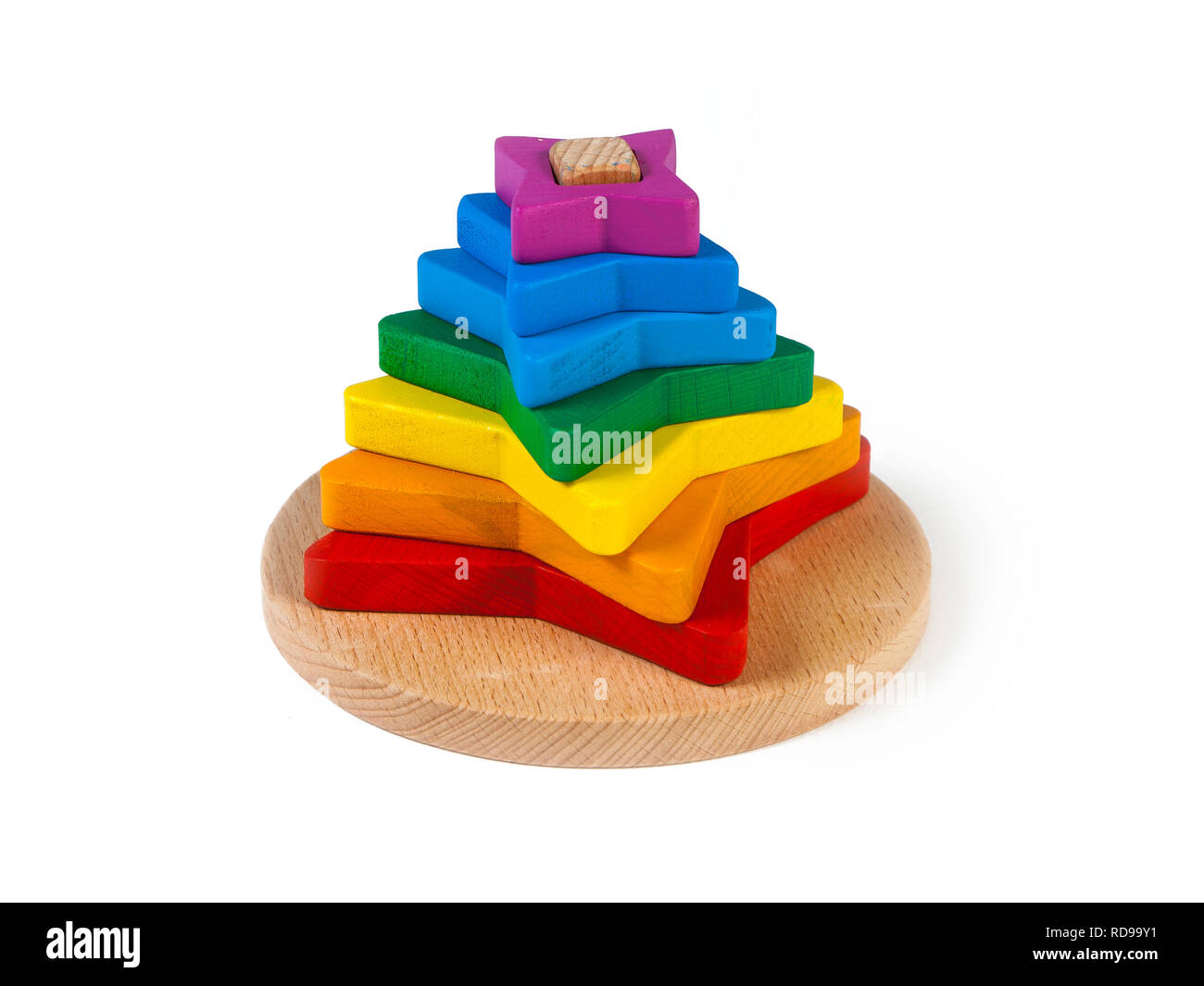 Photo of a wooden toy children's sorter pyramid of colorful parts in ...