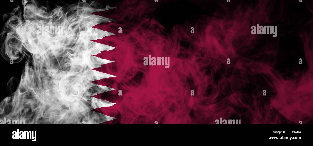National flag of Qatar from thick colored smoke on a black isolated ...