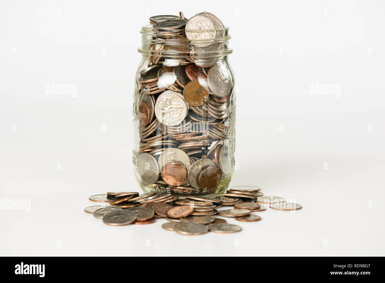 Money in a glass jar Stock Photo - Alamy