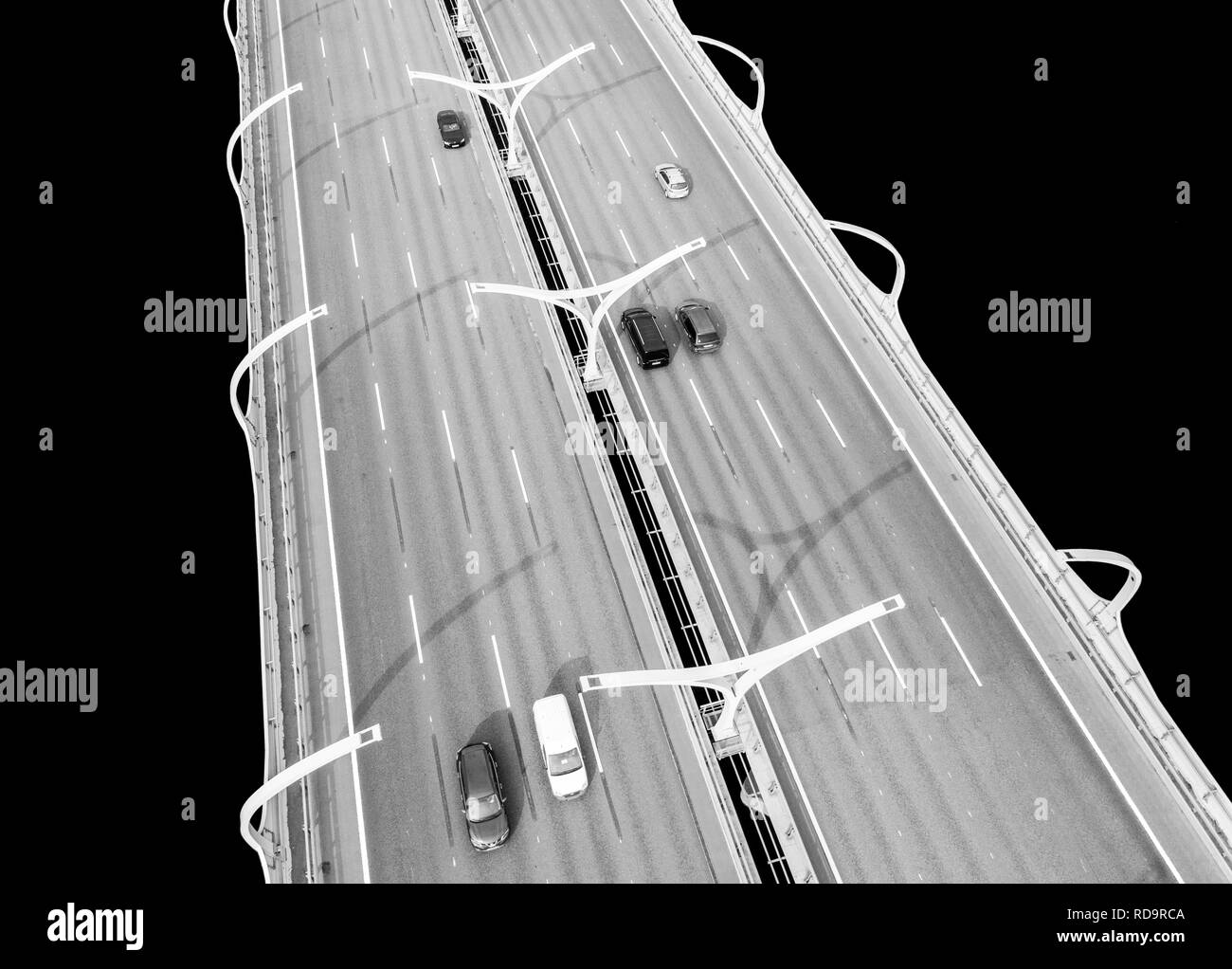 Aerial view of highway in the ocean. Cars crossing bridge interchange ...
