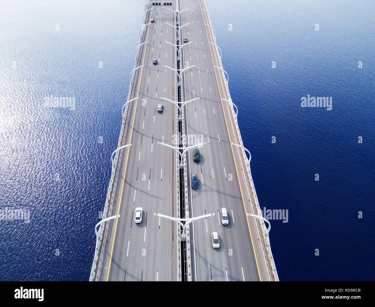 Aerial view of highway in the ocean. Cars crossing bridge interchange ...