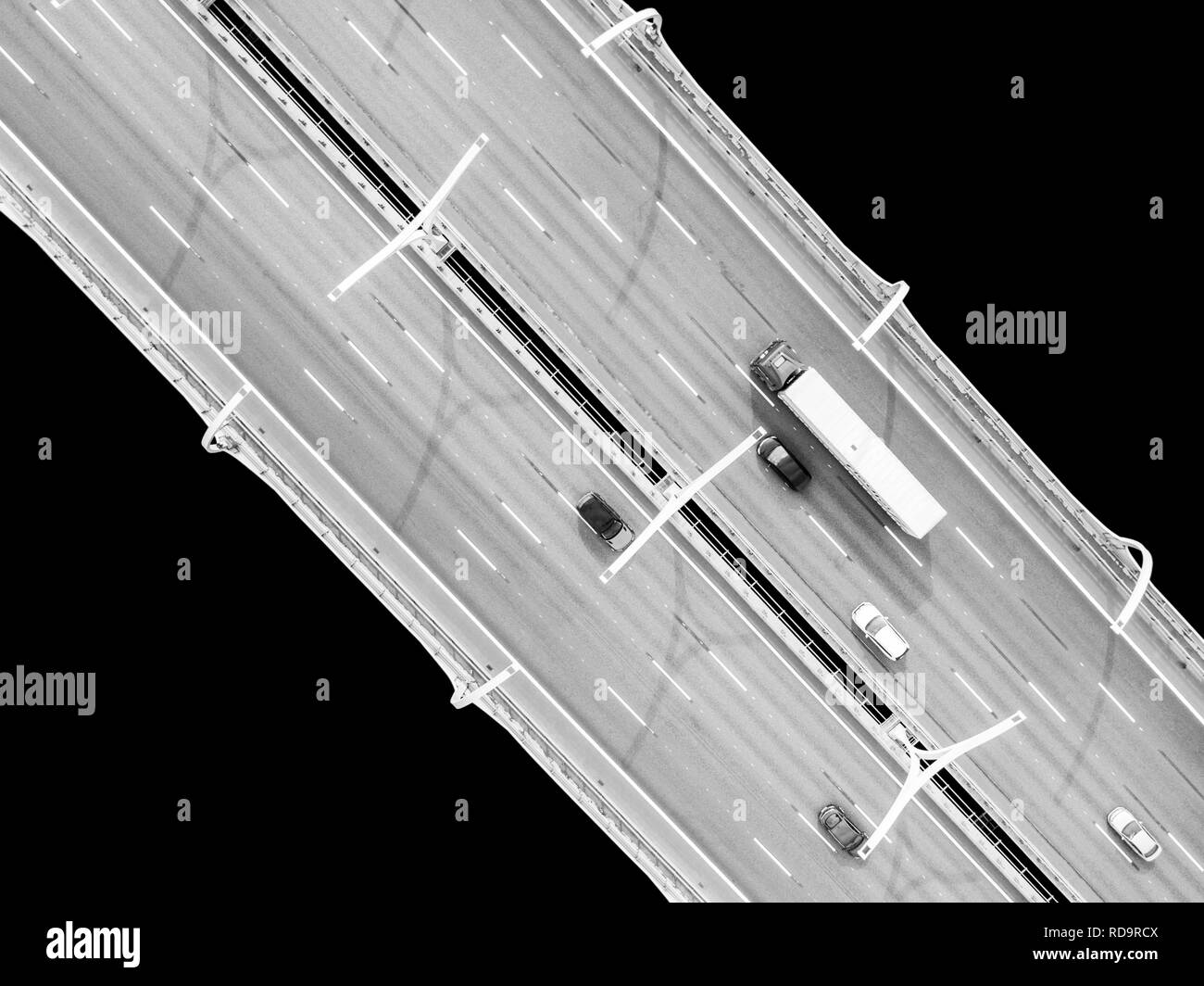 Aerial view of highway in the ocean. Cars crossing bridge interchange ...