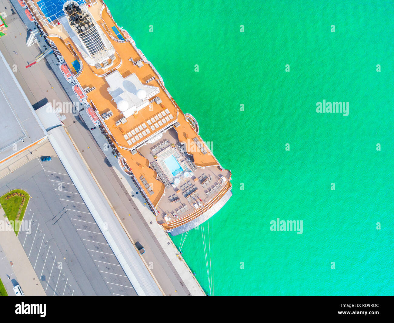 Aerial View by Drone of Cruise ship at harbor. Top view of beautiful ...