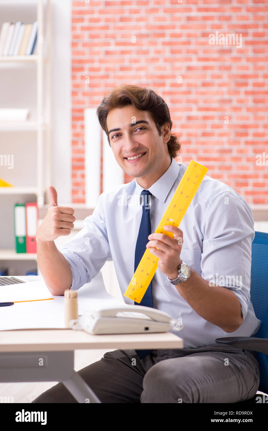 Construction supervisor working on blueprints Stock Photo - Alamy