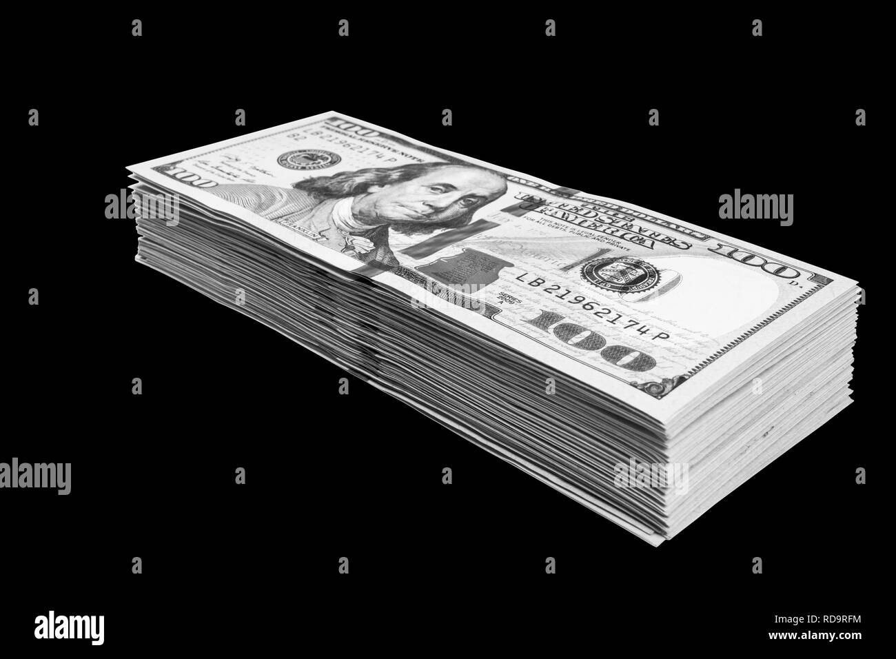 Stack of one hundred dollar bills isolated on black background. Stack ...