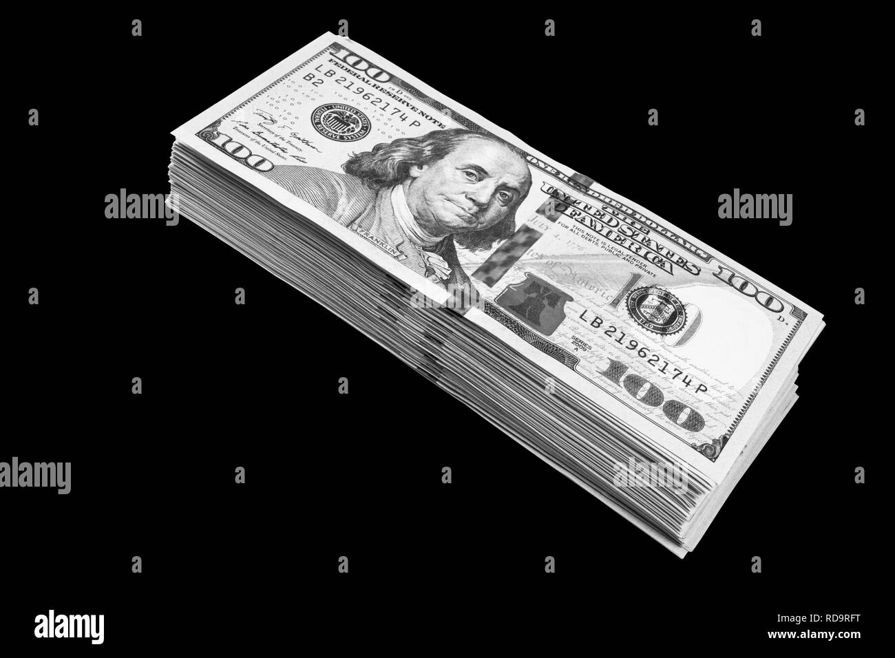 Stack of one hundred dollar bills isolated on black background. Stack ...