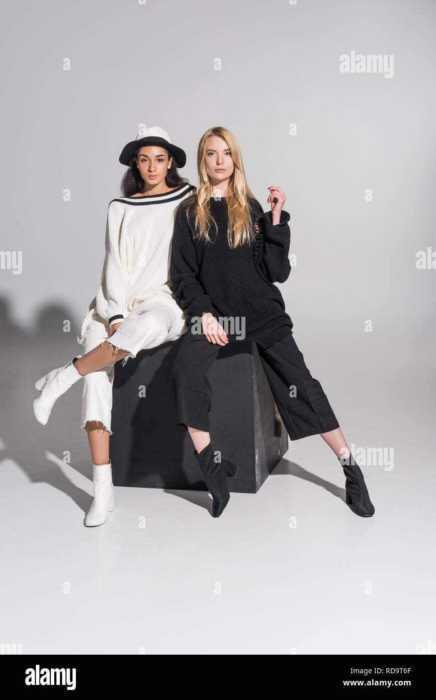 beautiful multicultural female models in fashionable black and white ...