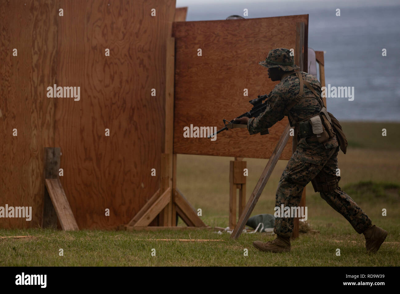 A U.S. Marine participates in the Marine Corps Marksmanship Competition ...