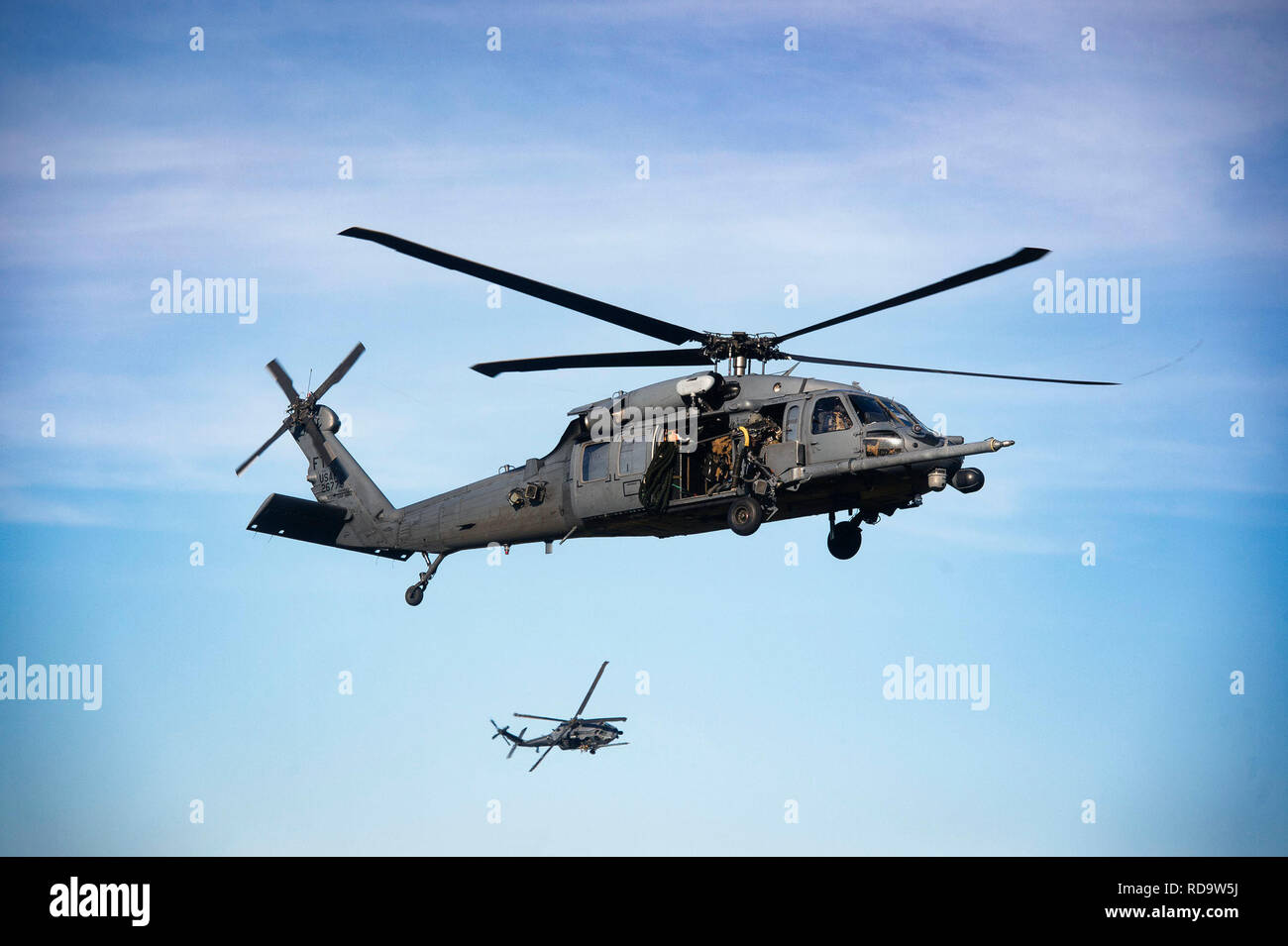 HH-60G Pave Hawks from the 41st Rescue Squadron (RQS) execute tactical ...