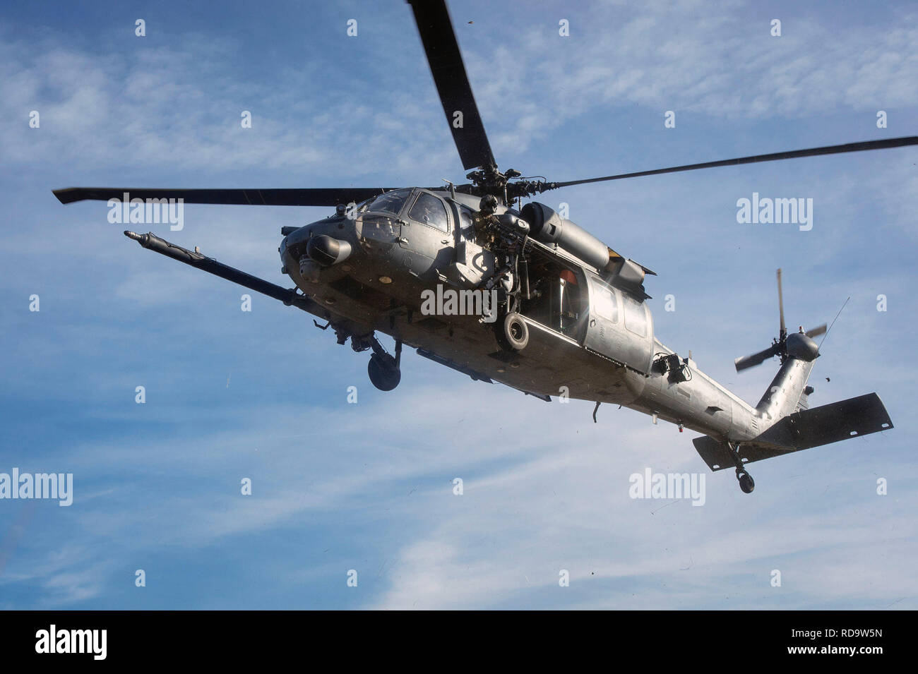 A 41st Rescue Squadron special missions aviator scans for simulated ...