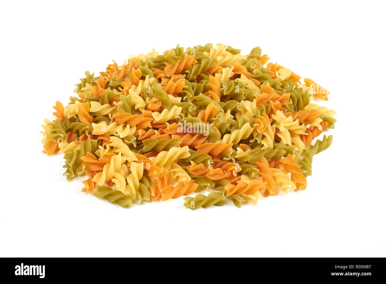 Raw colorful italian fusilli pasta isolated on white Stock Photo - Alamy
