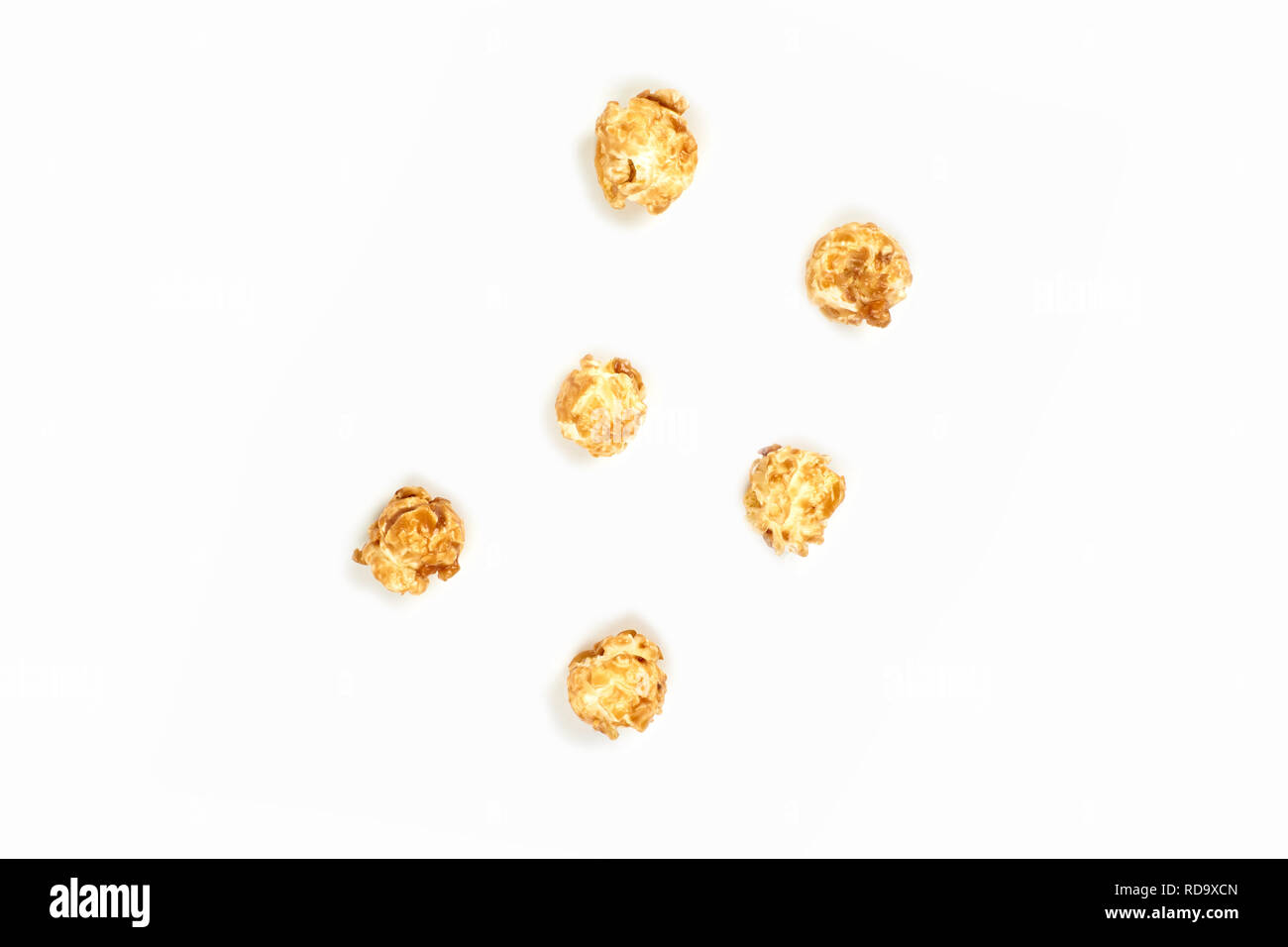 caramel popcorn on white background Stock Photo - Alamy