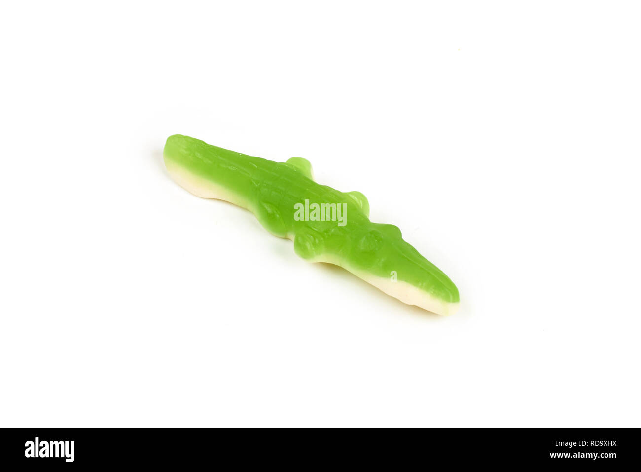 jelly candies in the crocodile shape isolated on white background Stock ...