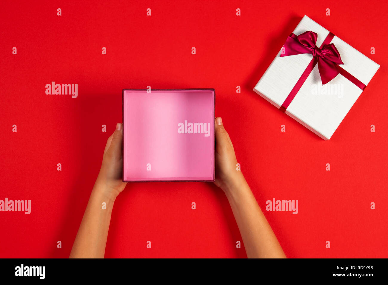 Present box template mock up. Hand open empty present gift box on ...