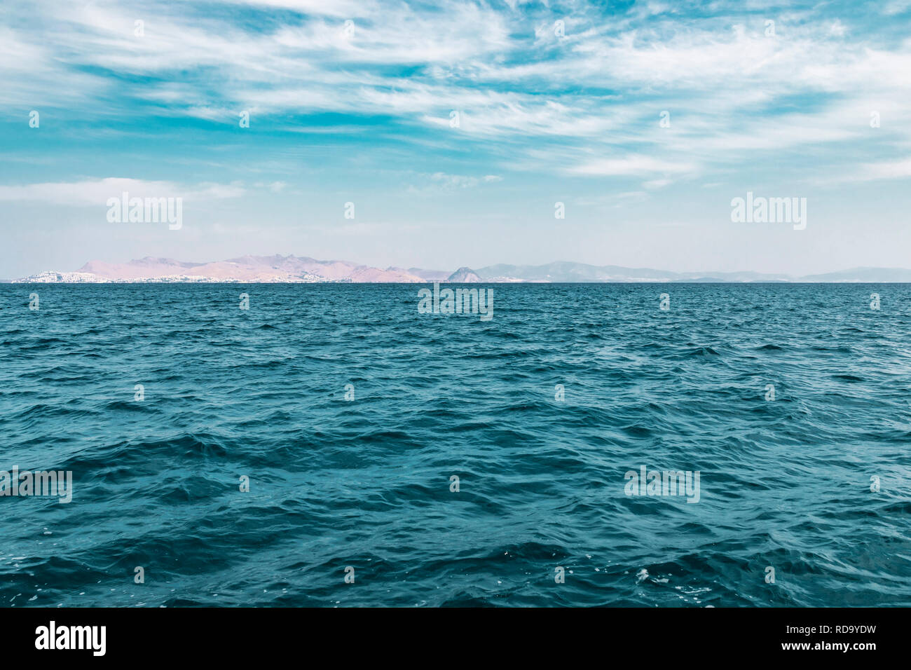 Shot of agitated deep blue sea with background of Turkish land Stock ...