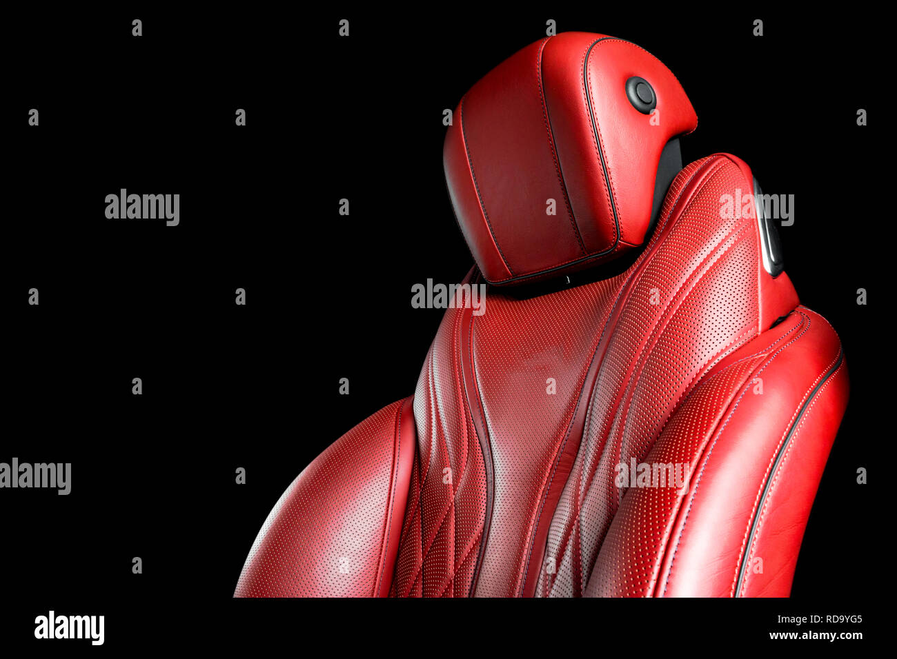 Red leather interior of the luxury modern car. Perforated red leather ...