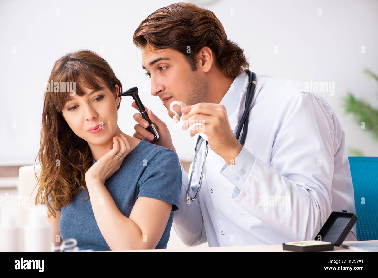 Patient with hearing problem visiting doctor otorhinolaryngologist ...