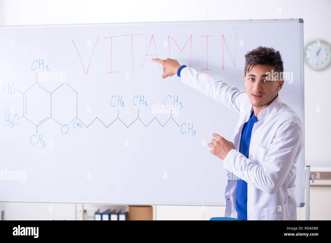 Scientist standing in front whiteboard hi-res stock photography and ...